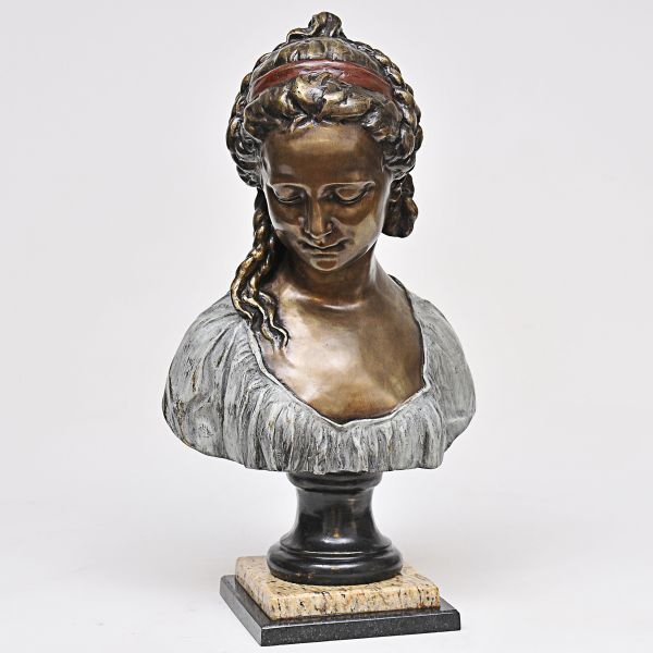Busto em bronze patinado e policromado representando